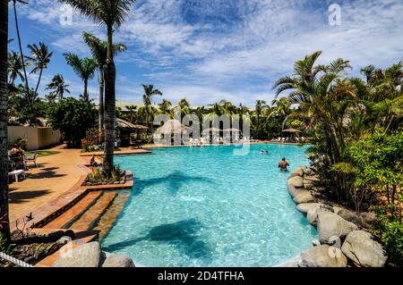 The main swimming pool at the Outriggers Fiji Beach Resort near ...