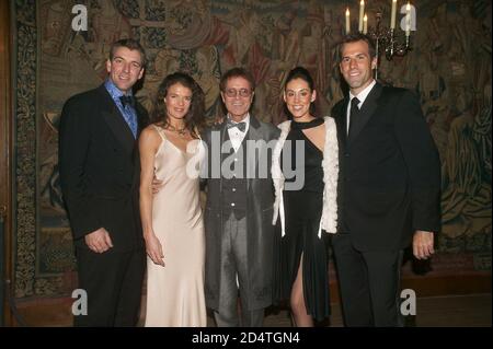 British tennis star Greg Rusedski walks with his wife, Lucy, after ...