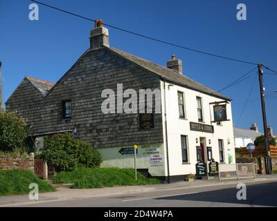 The Bettle and Chisel pub sign in Delabole, Cornwall, depicts a slate ...