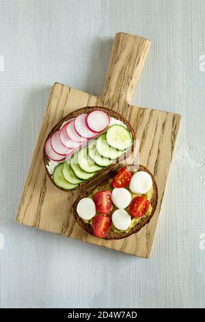 sandwiches with two slices of flat bread between which are placed ham ...