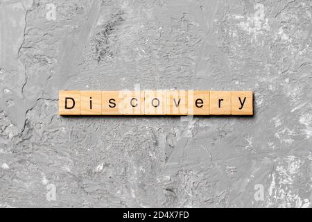 discovery word written on wood block. discovery text on table, concept ...