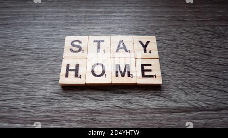 STAY HOME word text background Stock Photo - Alamy