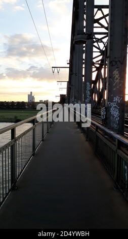 Cyclist on River Rhine Bridge, Quartier St. Johann, Basel, Canton Basel ...