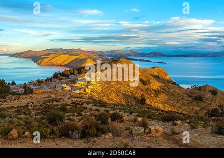Sunset with clouds over Lake Titicaca, Puno Province, Peru Stock Photo ...
