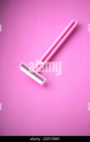 Female pink razor shaver isolated on white background Stock Photo - Alamy