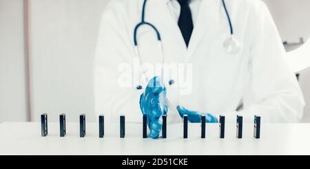 close up. doctor using dominoes to show a safe distance Stock Photo - Alamy