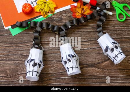 Halloween paper decorations on wooden background Stock Photo - Alamy