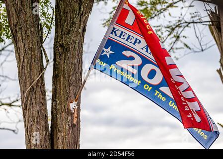 Pro Republican signage and a Trump flag are on display in West Branch ...