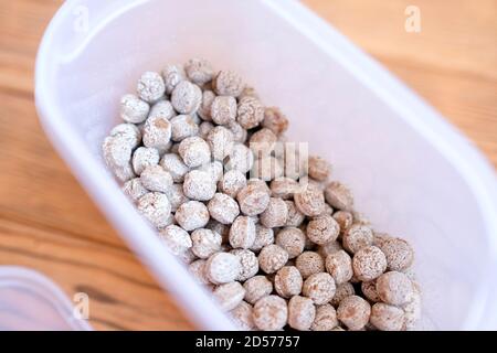 Bran in a container. Dry edible balls Stock Photo - Alamy