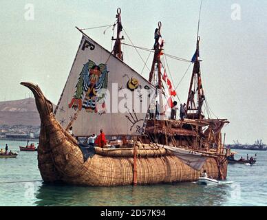 Aymara man in a reed boat on Lake Titicaca, Bolivia Stock Photo - Alamy