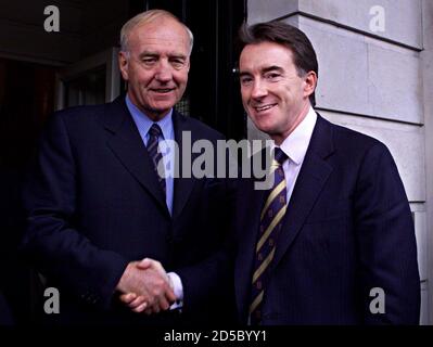 Northern Ireland Secretary Peter Mandelson with his dogs Jack and ...