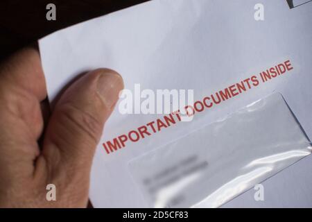 A second class A4 envelope marked with red words - Important Documents ...