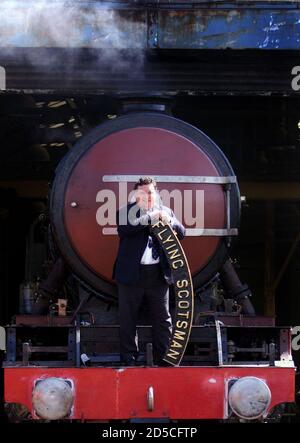 Steam train Flying Scotsman with owner Alan Pegler seen here standing ...