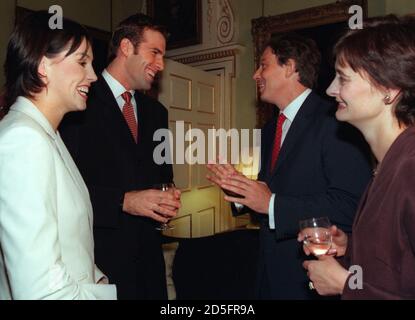 British tennis star Greg Rusedski and his bride Lucy Connor pose after ...