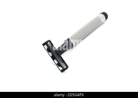 A picture of used hair razor on white background Stock Photo - Alamy