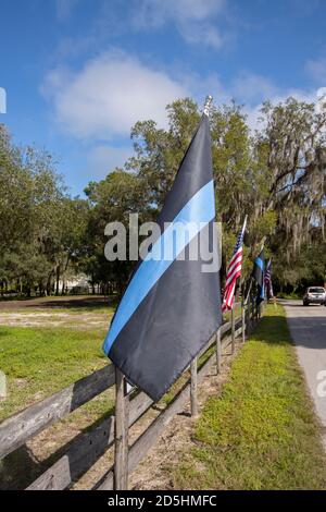 Blue Lives Matter flag aka Police Thin Blue Line flag, waving in the ...