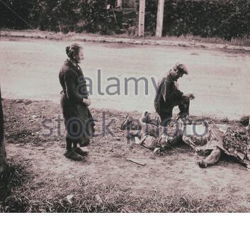 6 JUNE 1944 - Dead US soldier on Omaha beach as tide recedes exposing ...