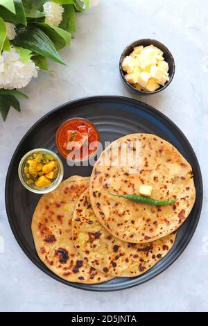 Indian stuffed potato bread Aloo Paratha Stock Photo - Alamy