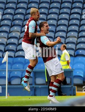 Burnley's Sam Vokes (right) celebrates scoring his side's first goal of ...