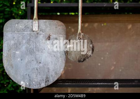 Cooking utensils hanging up in a kitchen in a large restaurant Stock ...