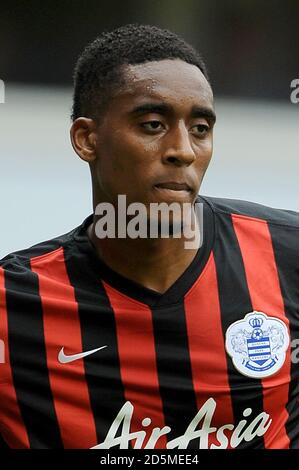 Queens Park Rangers' Leroy Fer raises his arm to the crowd after his ...