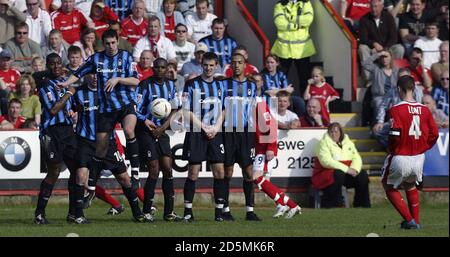 Crewe Alexandra's Kenny Lunt and Nottingham Forest's Andy Reid battle ...