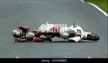 Jon Kirkham crashes out in the wet conditions on his kawasaki Stock ...
