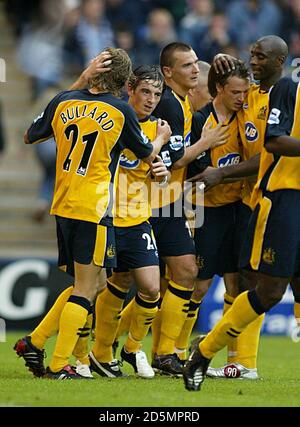Wigan Athletic's David Connolly (R) celebrates after his equalising ...