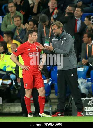 Liverpool's James Milner (left) and Liverpool manager Jurgen Klopp ...