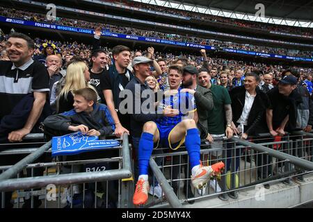 AFC Wimbledon's Jake Reeves in action during the Sky Bet League Two ...