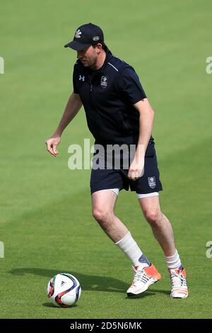Surrey's Mark Footitt plays football during the warm up Stock Photo - Alamy