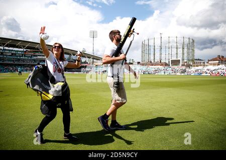 A Kia Master Blaster launches t-shirts into the crowd Stock Photo - Alamy