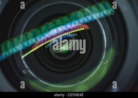 A closeup shot of a professional camera lens isolated on white ...