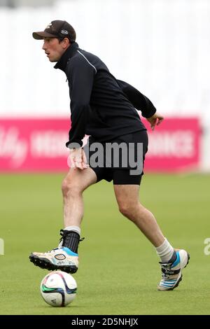 Surrey's Mark Footitt plays football during the warm up Stock Photo - Alamy