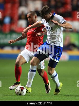 Charlton Athletic's Josh Magennis (left) and Oldham Athletic's Ryan ...
