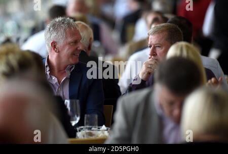 A general view as racegoers enjoy food and drink in the carpark on day ...