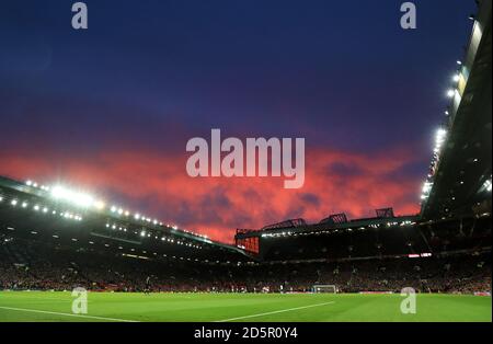 The sunset over Old Trafford towards the end of the game Stock Photo ...
