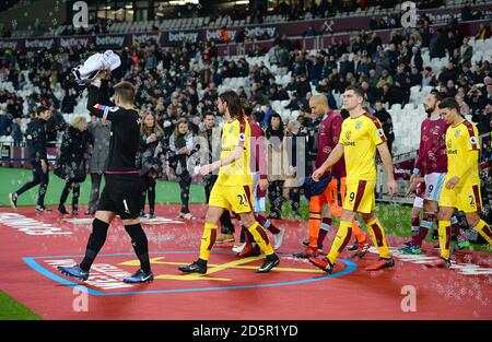 West Ham United and Burnley players observe a minutes silence for ...