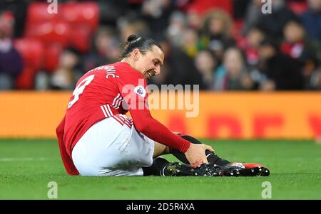 Manchester United's Zlatan Ibrahimovic holds the back of his head after ...