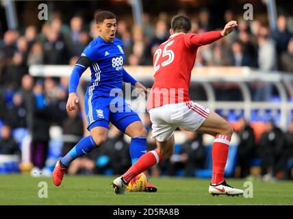 Birmingham City's Che Adams (left) and Swansea City's Cameron Carter ...