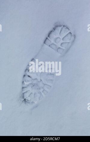 boot footprint in virgin snow Stock Photo - Alamy