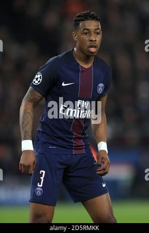 Presnel Kimpembe of Paris Saint-Germain FC hugs the trophy during the ...