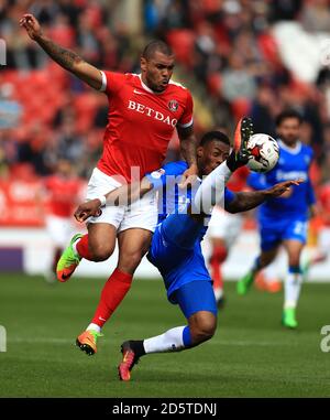 Charlton Athletic's Josh Magennis (left) and RochdaleÕs Joe Rafferty ...