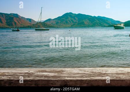 Plank Wood table top with blur nightclub bar counter with bokeh light ...