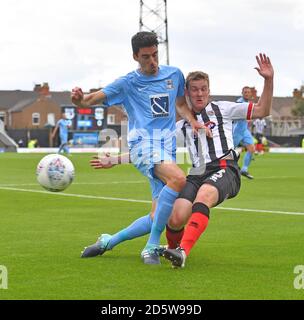 Coventry City's Peter Vincenti battles with Morecambe's Michael Rose ...