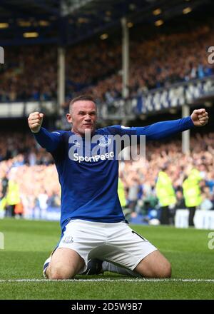 Everton's Wayne Rooney celebrates scoring his side's first goal of the ...