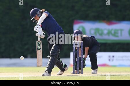 Team Sciver's (Blue) Nancy Harman walks back to the pavillion as Team ...