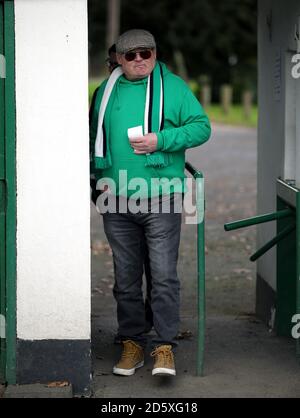 Fans make their way to Fetcham Grove prior to the match Stock Photo - Alamy