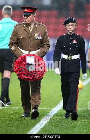Remembrance proceeding before kick off Stock Photo - Alamy