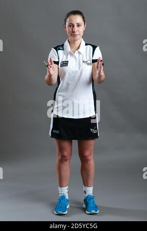 Umpire Kate Mann signalling obstruction of player with ball Stock Photo ...